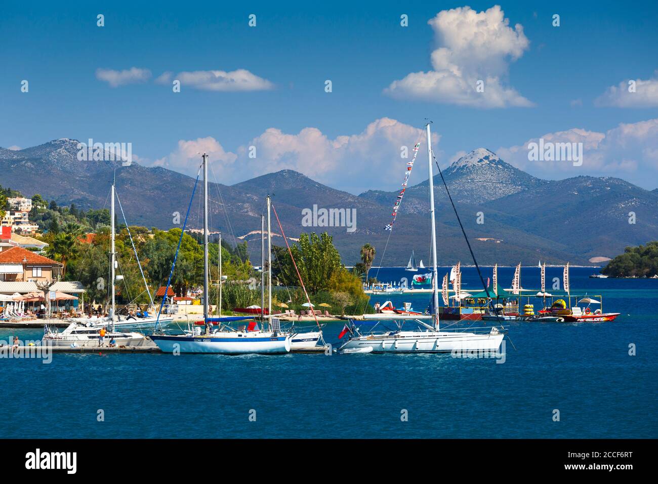 Boats in the harbour of Nydri village on Lefkada island in Greece Stock ...