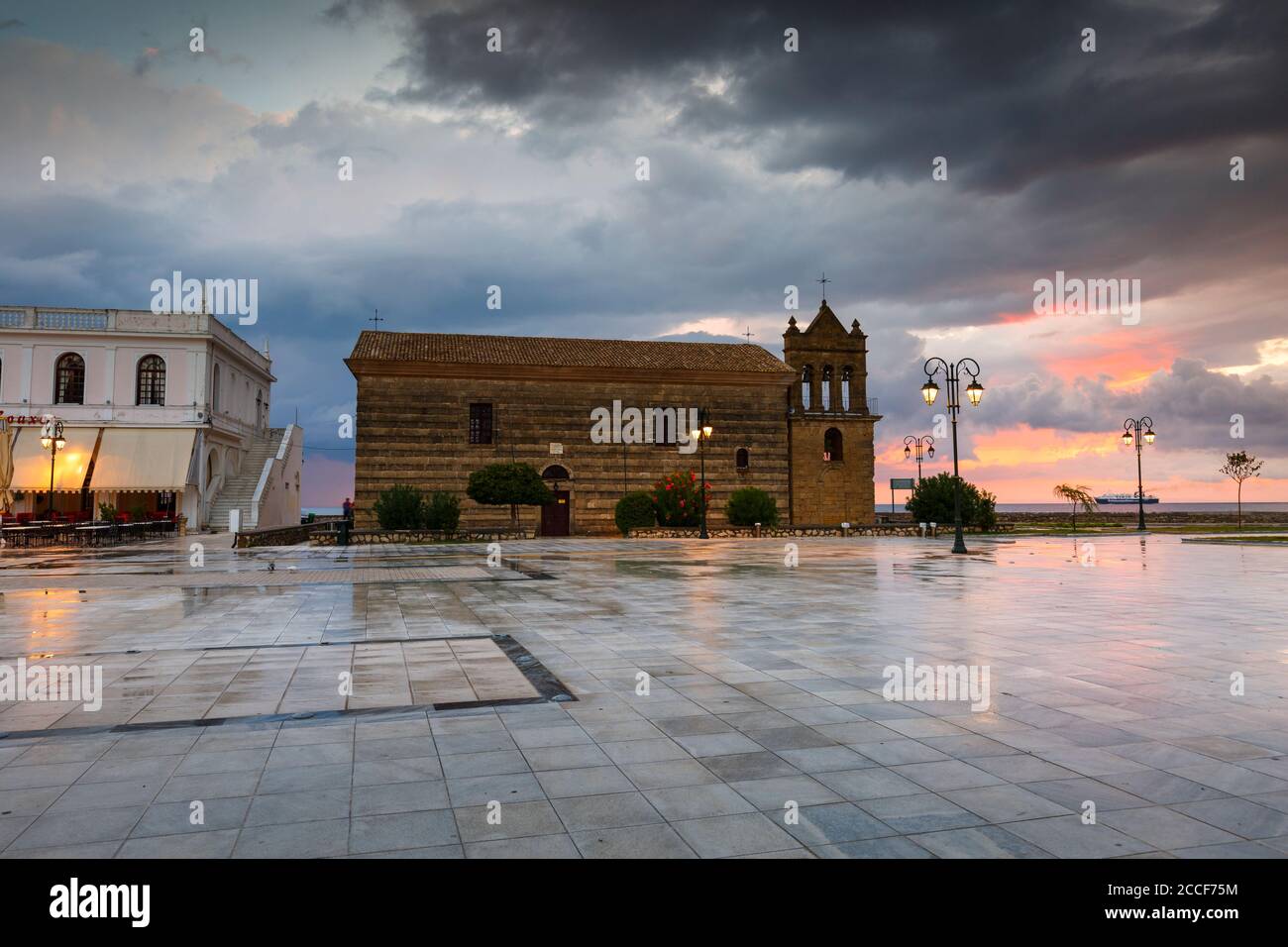 Sunrise at St Nikolaos Molou church in Solomos square in Zakynthos ...