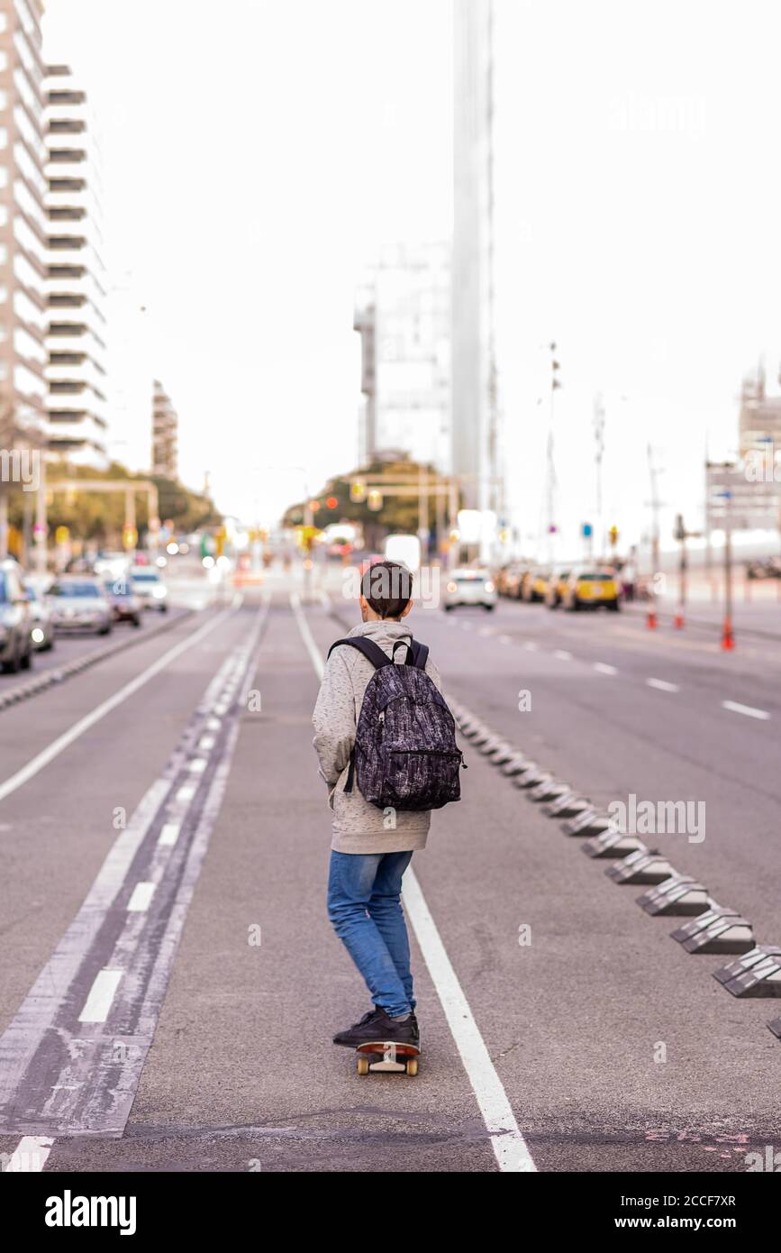 Rear view of 1 one teenager hi-res stock photography and images - Alamy