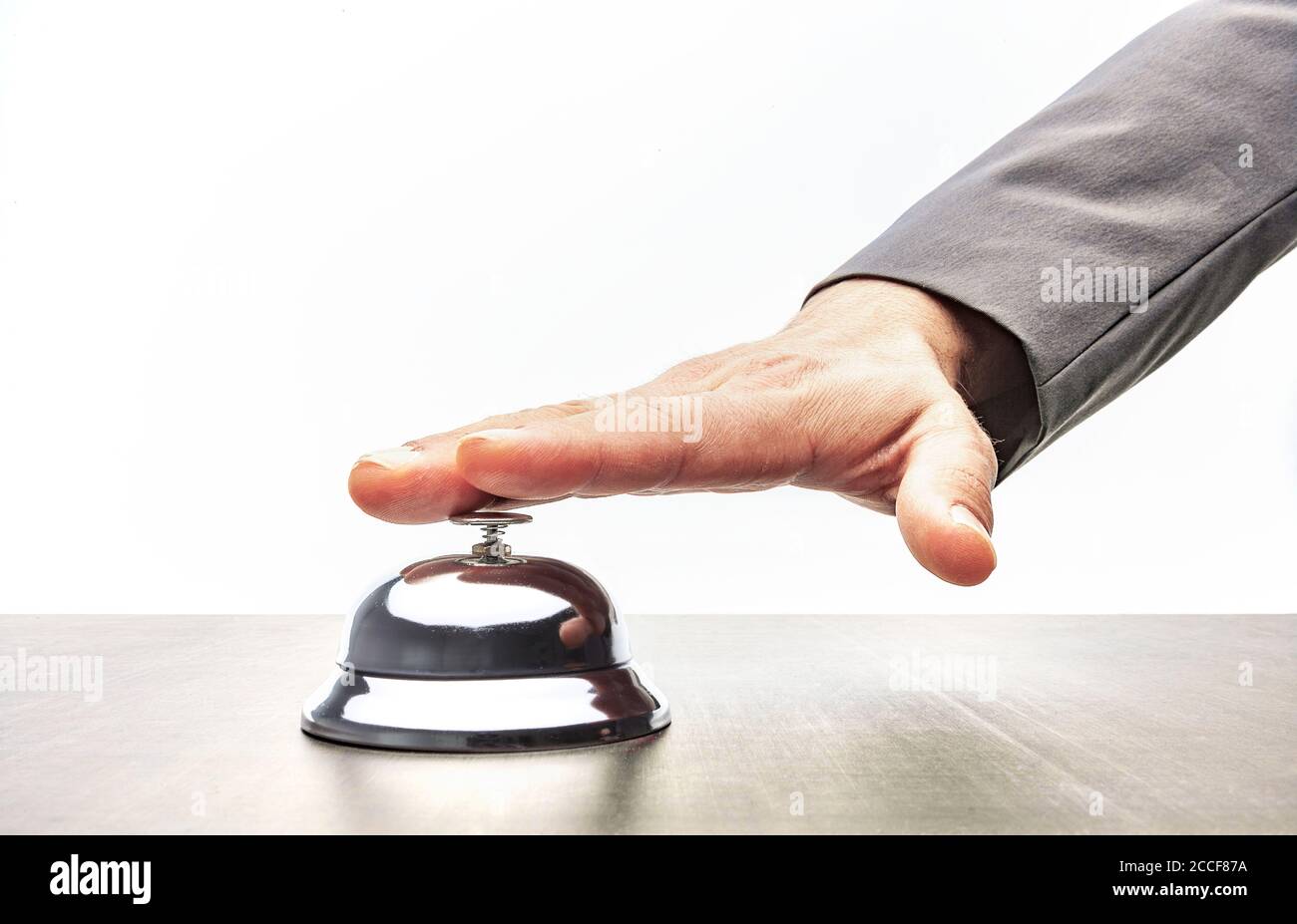 Table bell on a counter Stock Photo - Alamy