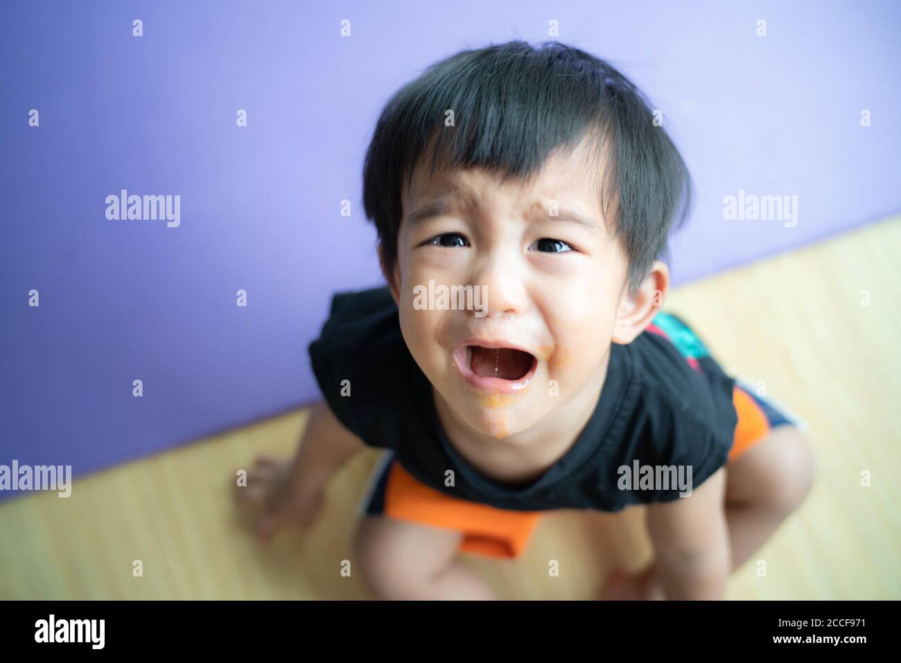 Little asian boy crying bitterly in room of house facial face mood ...