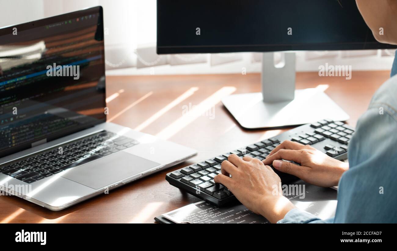 Programmer Or Software Developer Typing New Lines Of Code Coding