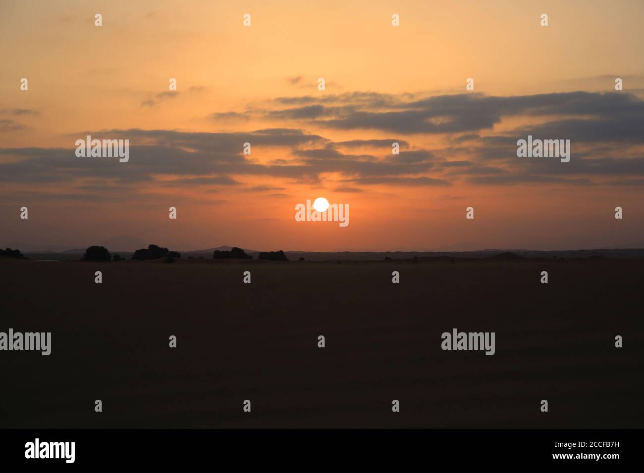 Sunrise in the desert at Abu Dhabi, UAE Stock Photo - Alamy