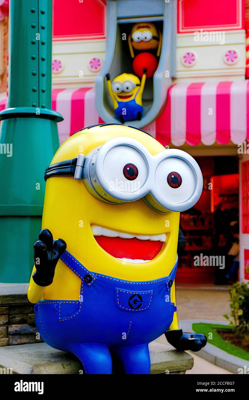 Close up of HAPPY MINION statue in Universal Studios Japan. Minions are ...