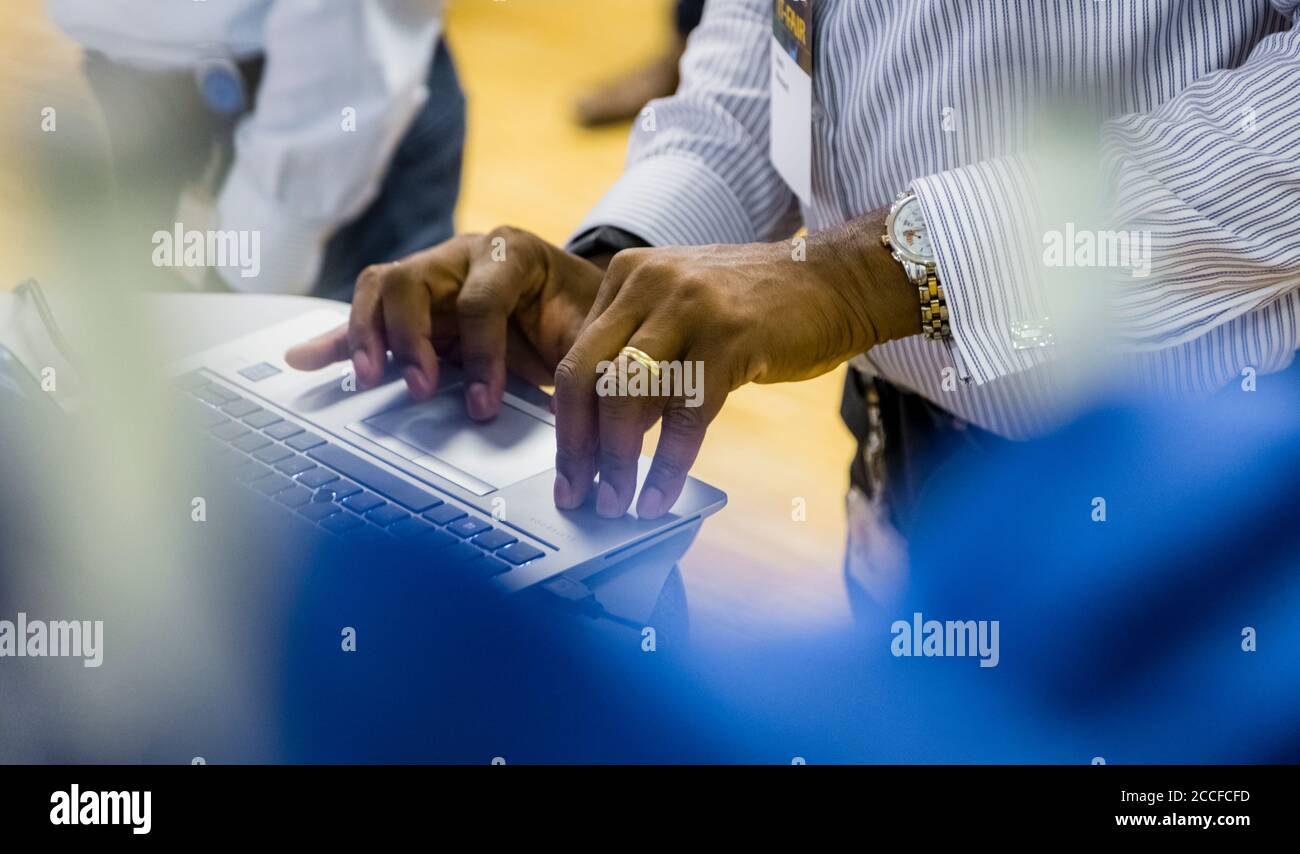 Hands in the digital work process Stock Photo - Alamy