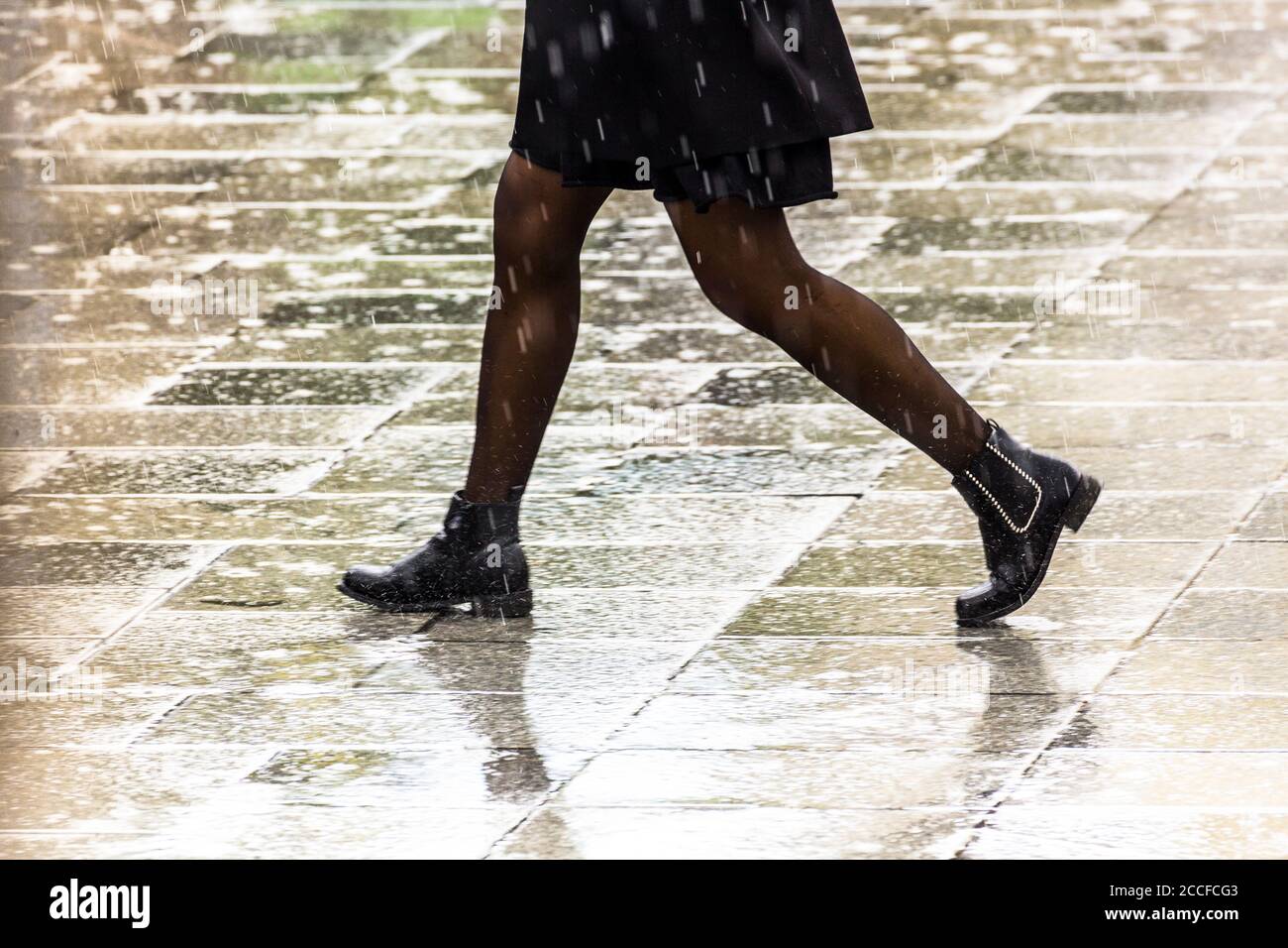Rain over town hi-res stock photography and images - Alamy
