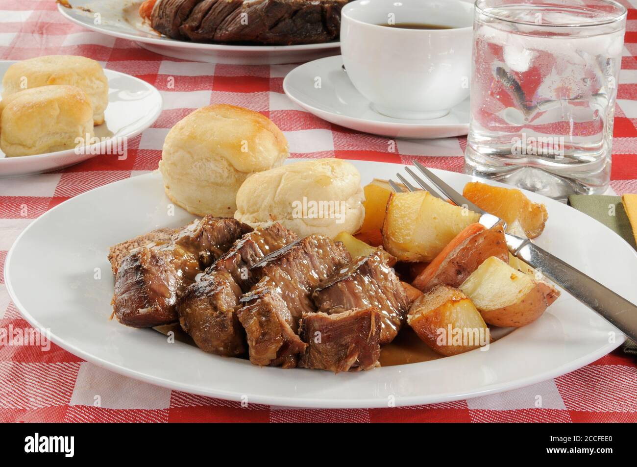 A plate of sliced pot roast and begetables Stock Photo - Alamy