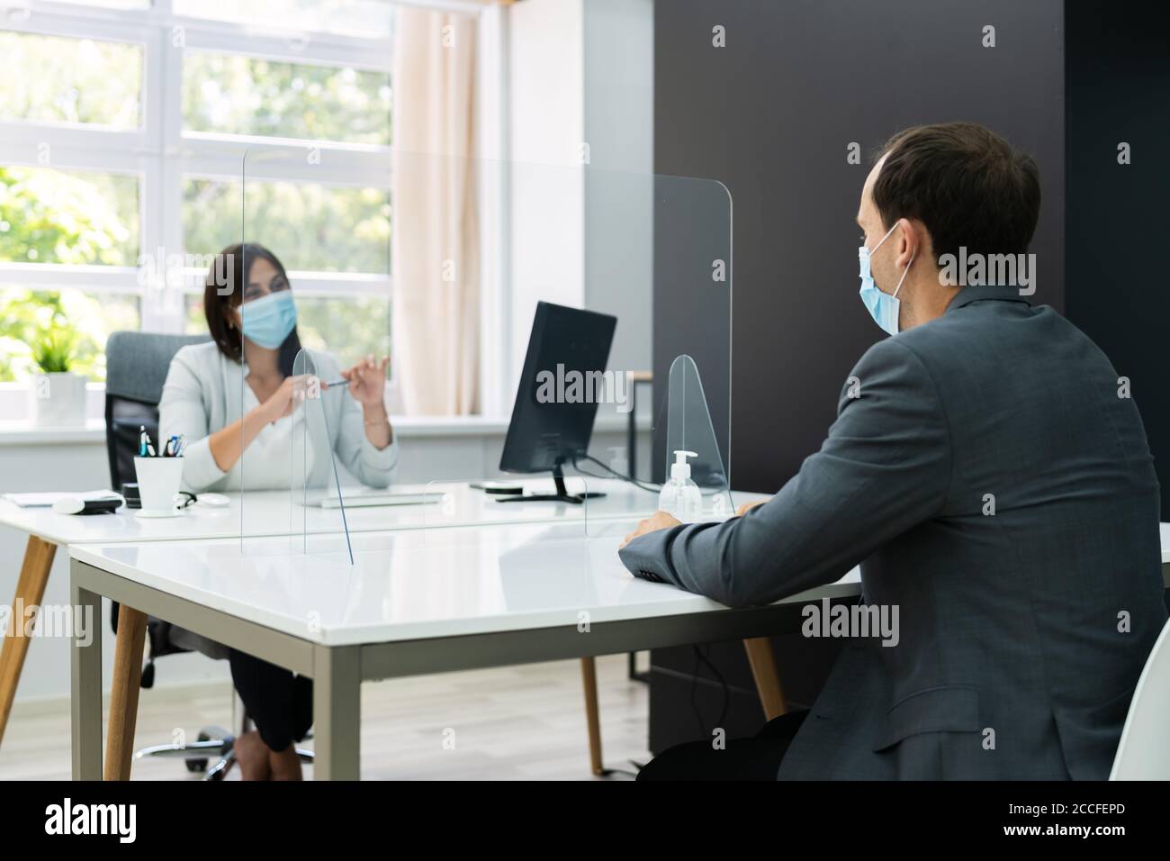 Female office worker wearing mask hi-res stock photography and images ...