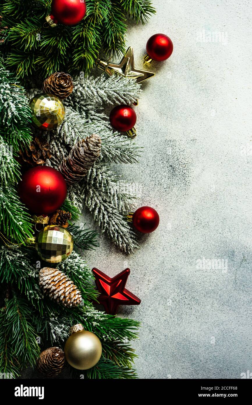 Christmas card concept with xmas tree and decor on concrete background ...