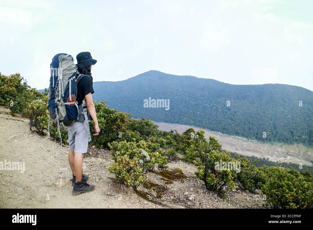 People hiking to Mount Gede in West Java Stock Photo - Alamy