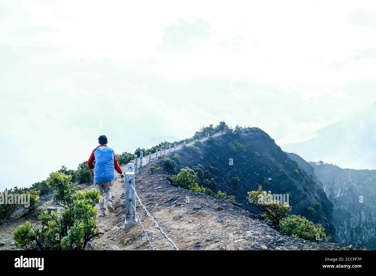 People hiking to Mount Gede in West Java Stock Photo - Alamy