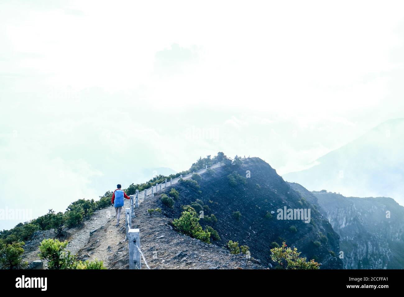 People hiking to Mount Gede in West Java Stock Photo - Alamy