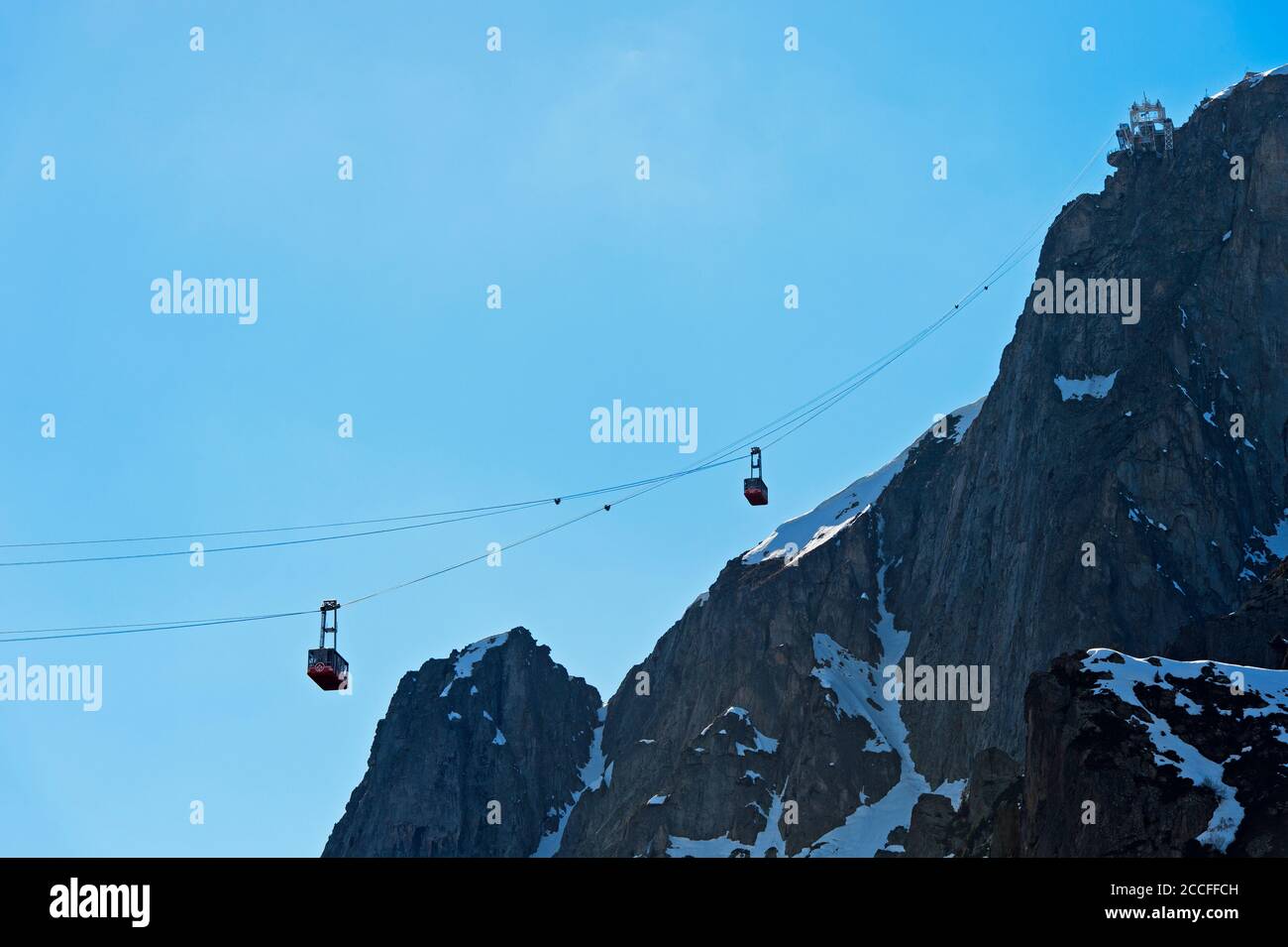 Two Brevent cable car cabins over a deep abyss, Planpraz, Chamonix ...