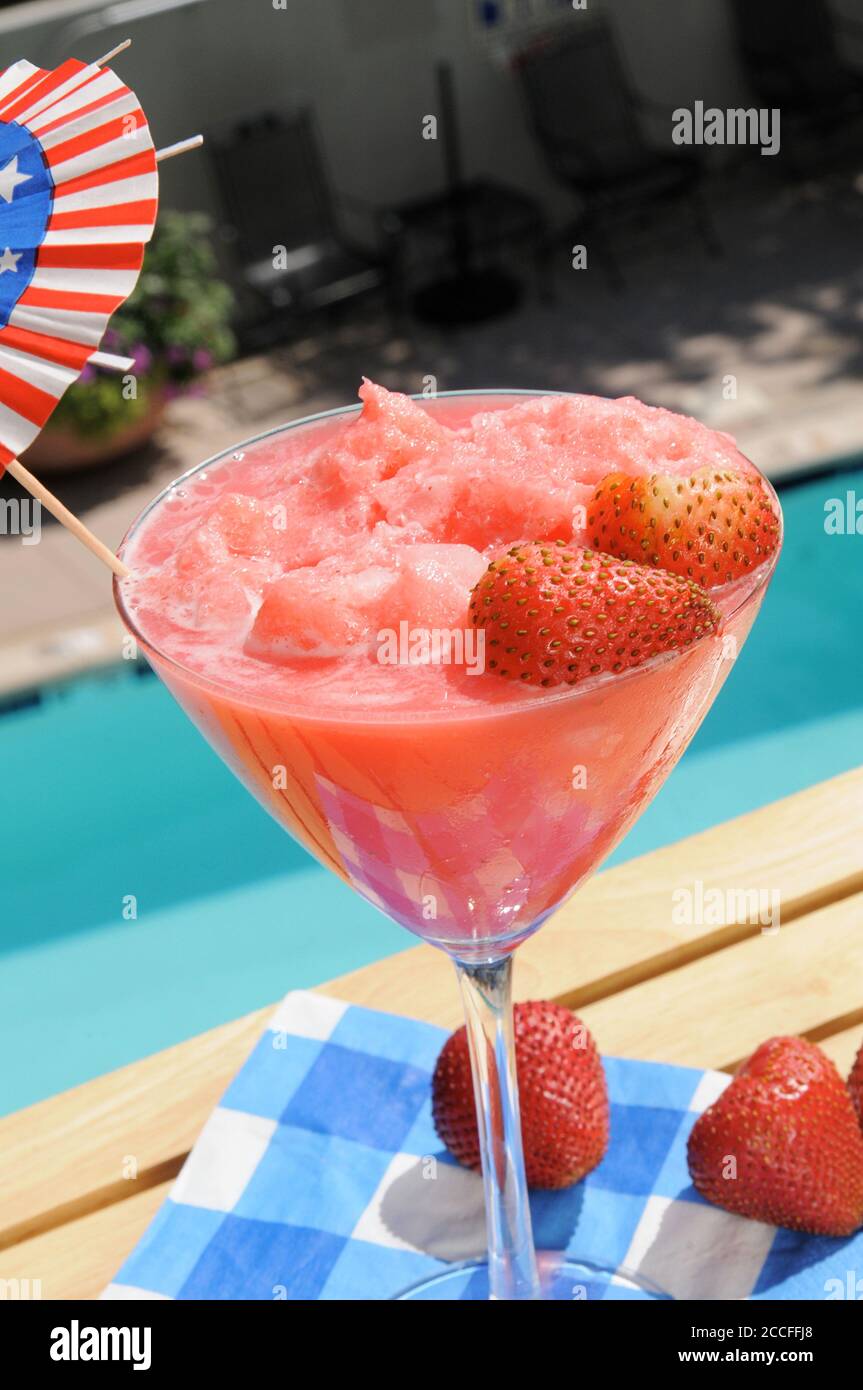 A frozen strawberry daiquiri by the pool Stock Photo - Alamy