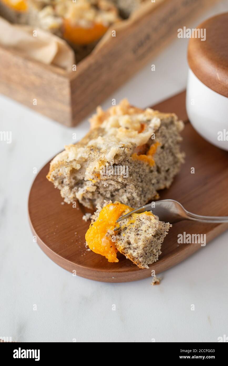 home made poppy seed pie with apricot and crumble Stock Photo - Alamy