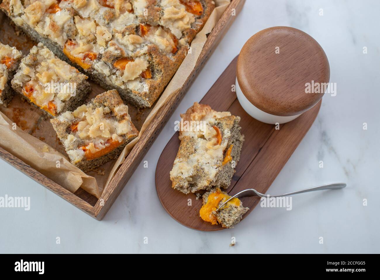 home made poppy seed pie with apricot and crumble Stock Photo - Alamy
