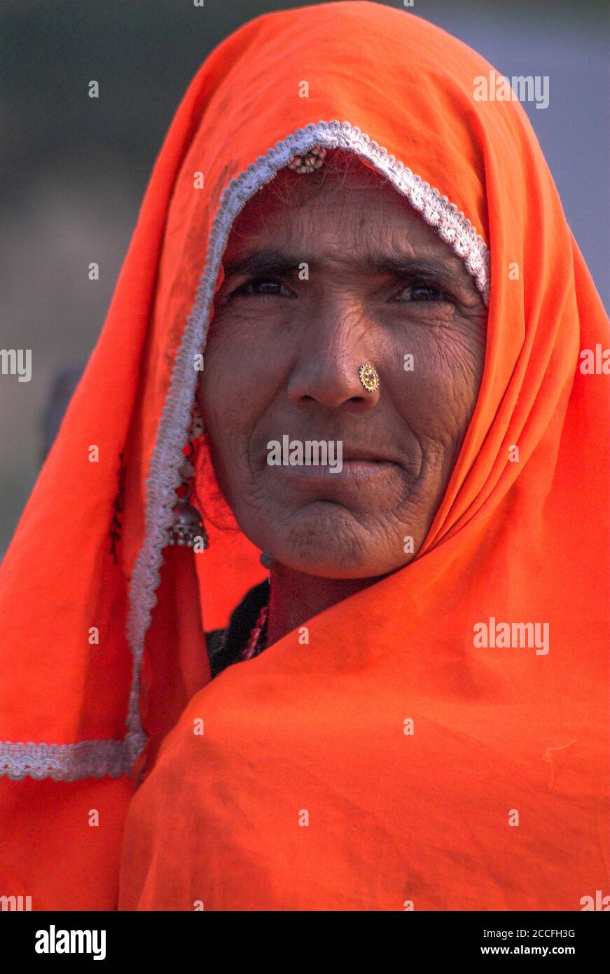 Portrait of a Rajasthani woman attending the camel fair at Pushkar ...