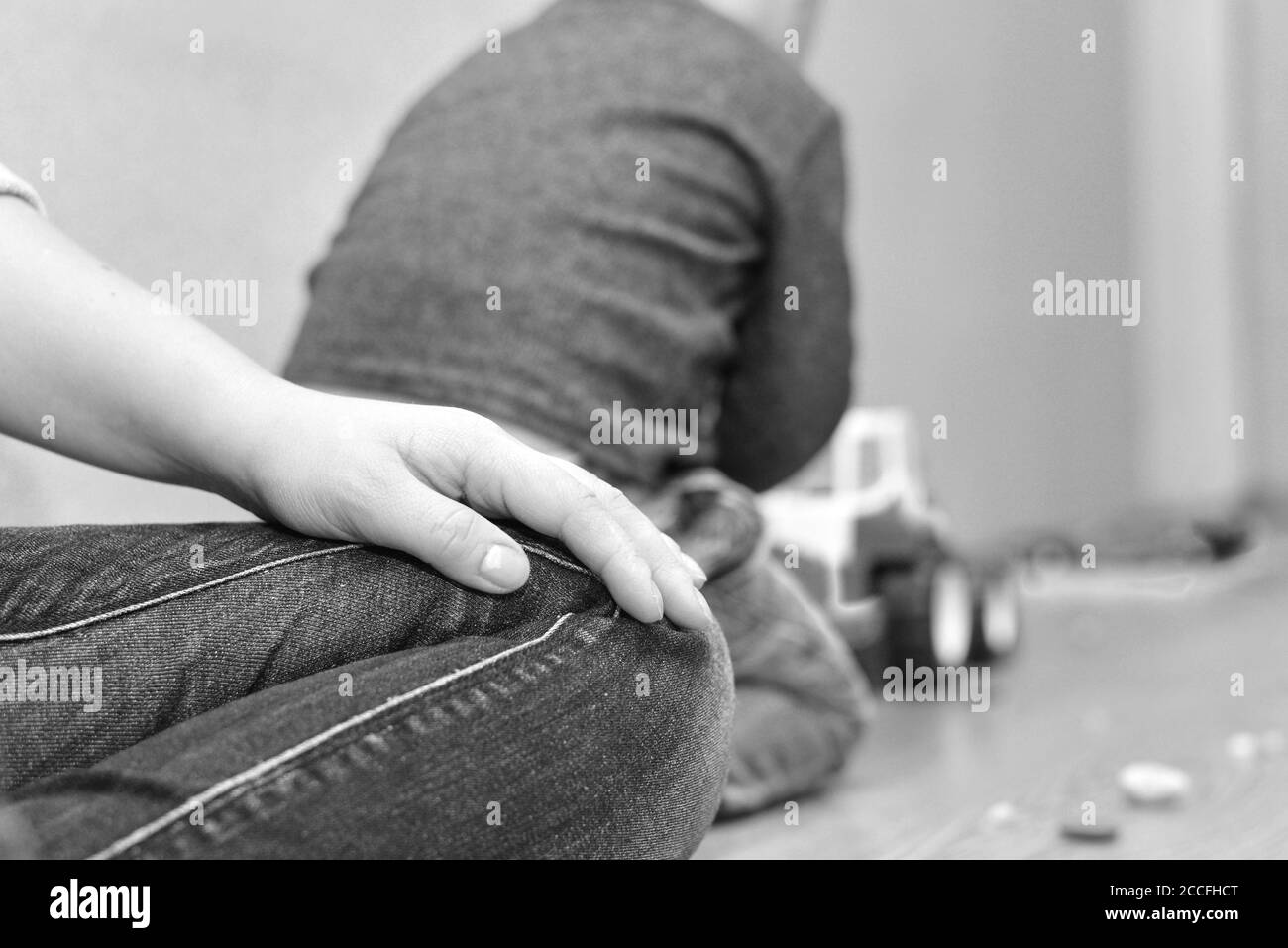 The child turned away from his mother and plays with toys, the topic of ...