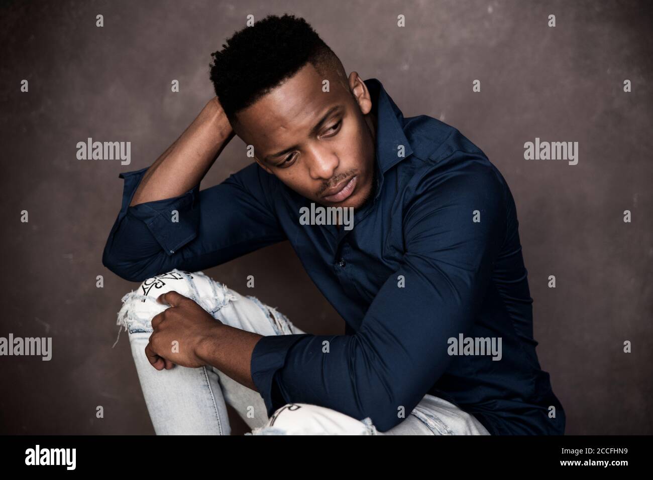 african stock photo of black gentlemen in smart clothes in studio ...