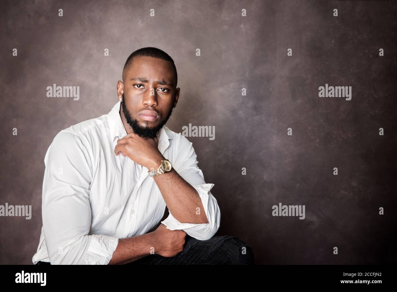 african stock photo of black gentlemen in smart clothes in studio ...