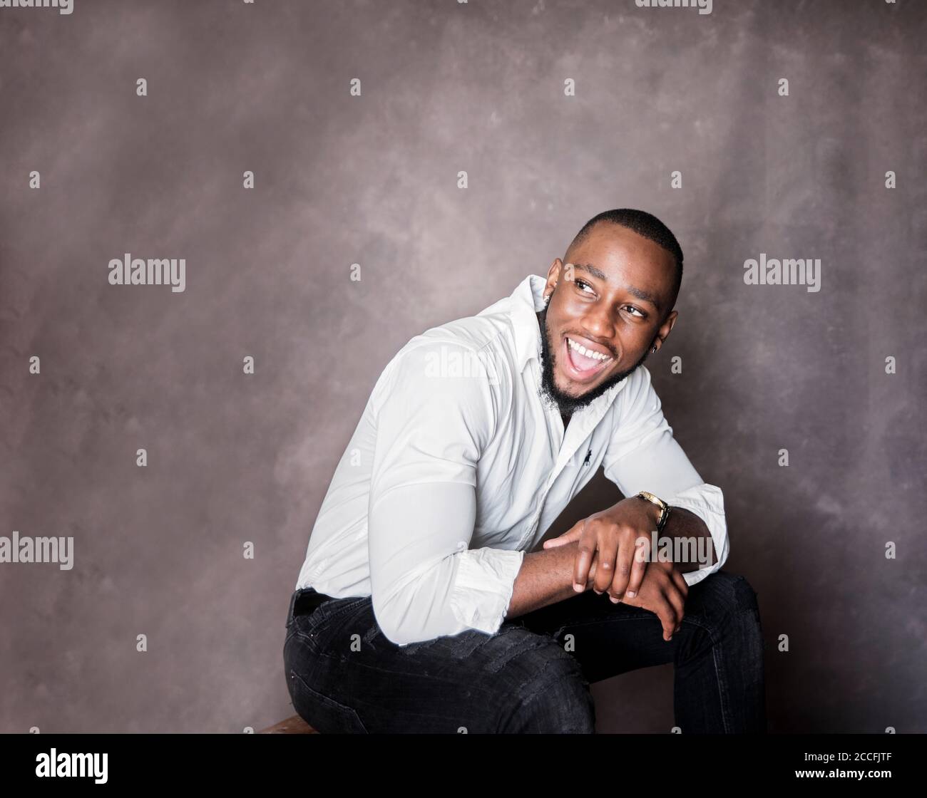 african stock photo of black gentlemen in smart clothes in studio ...