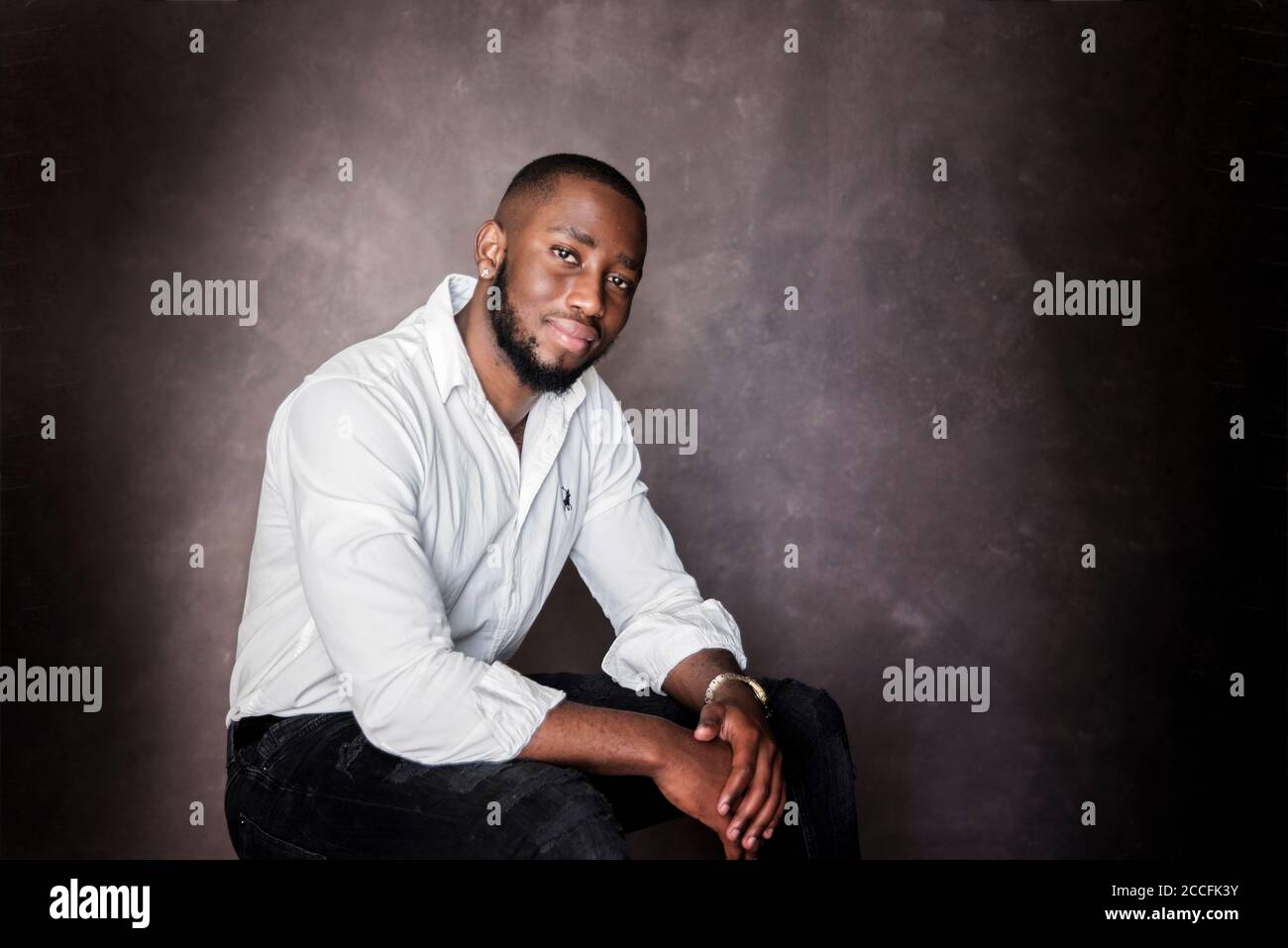 african stock photo of black gentlemen in smart clothes in studio ...