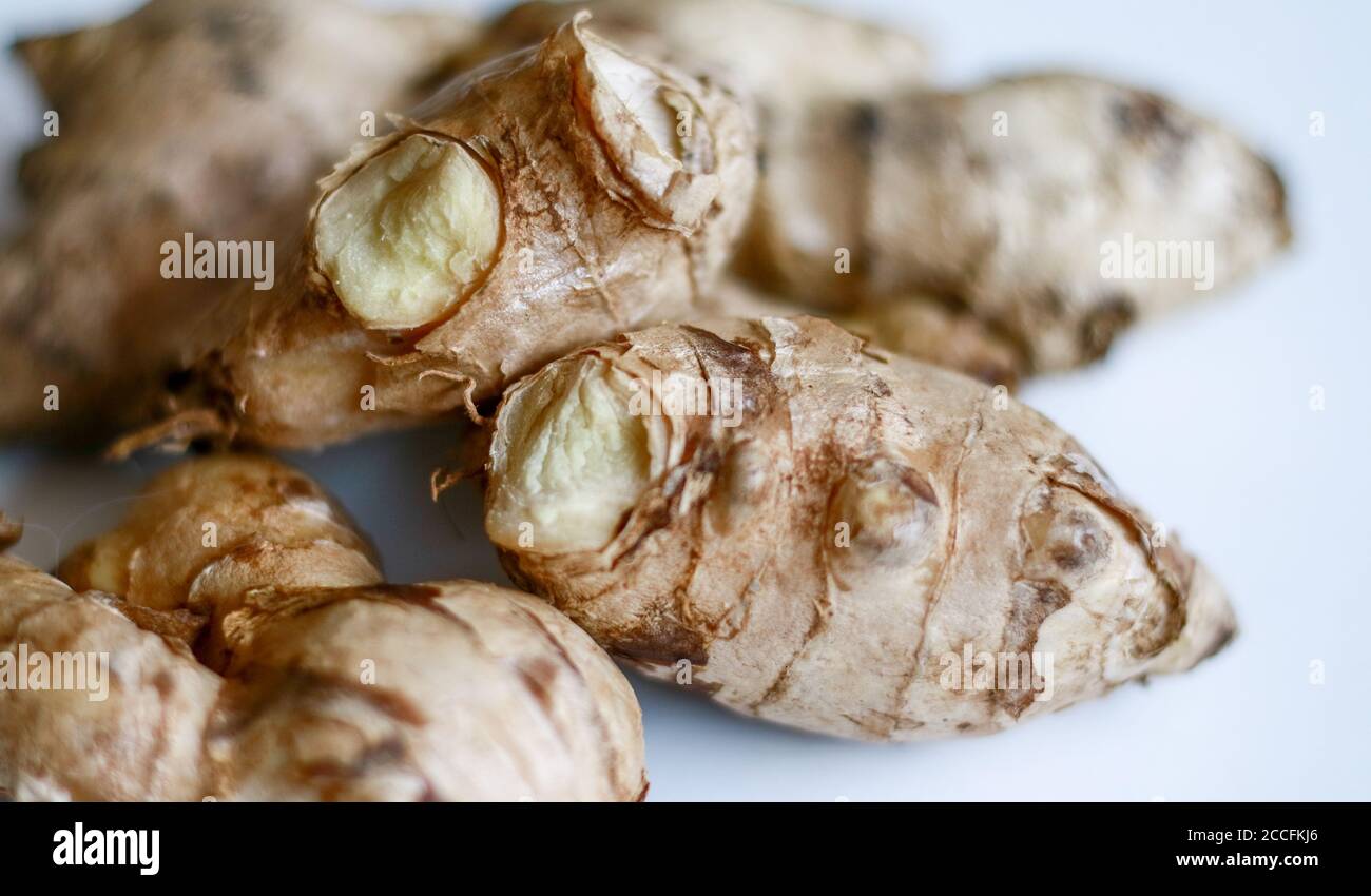 Ginger or Zingiber officinale on white background. Used as a spice and ...
