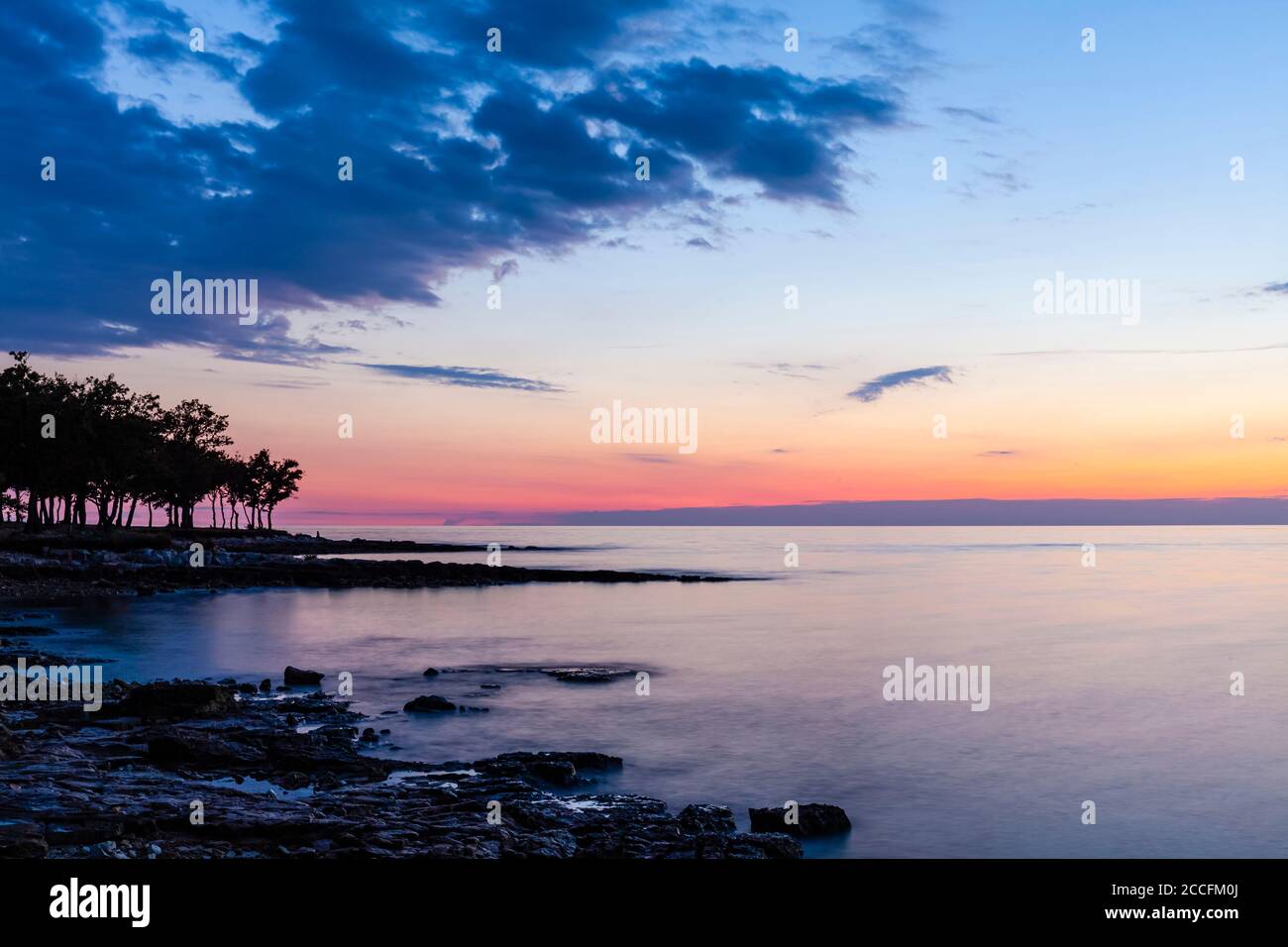 Coast, sunset glow, dawn, sea, mood Stock Photo - Alamy