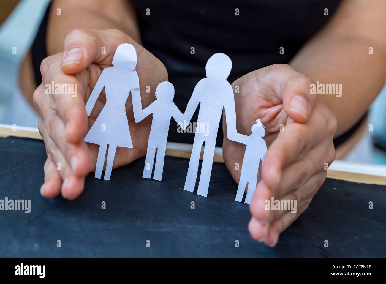 Home and family protection, Insurance concept Stock Photo - Alamy