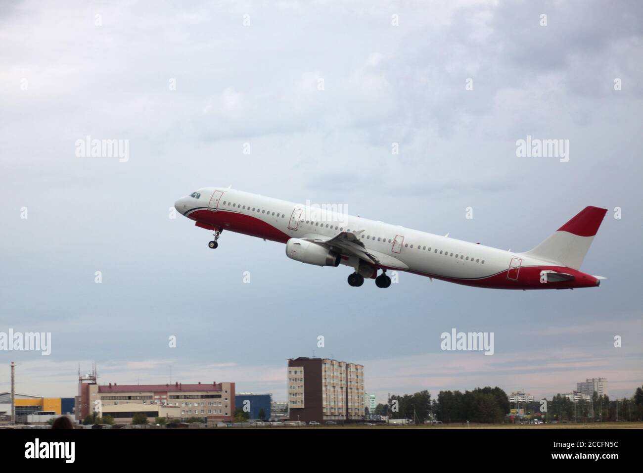 Passenger plane takes off from the airport runway. Side-view of aircraft. Horizontal image Stock ...