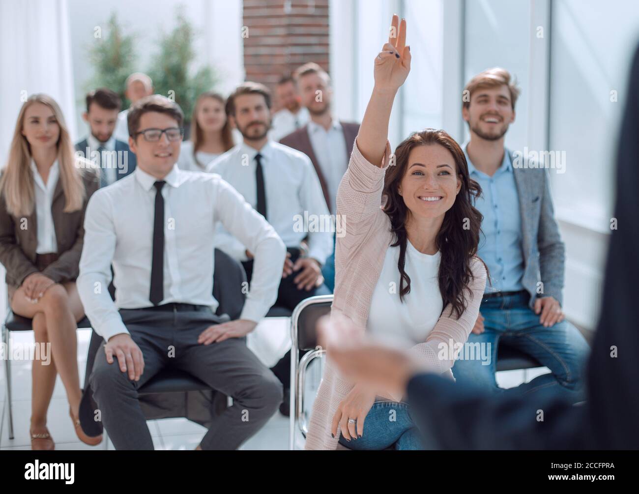 corporate team asks questions at a business meeting Stock Photo - Alamy