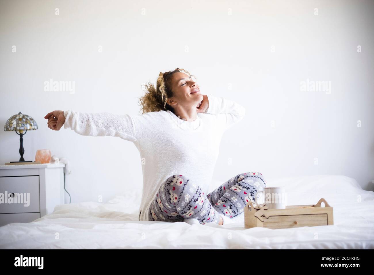 Woman getting ready for bed hi-res stock photography and images - Alamy