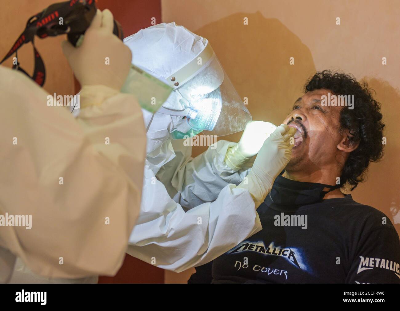 Conducting test covid test on street hi-res stock photography and ...