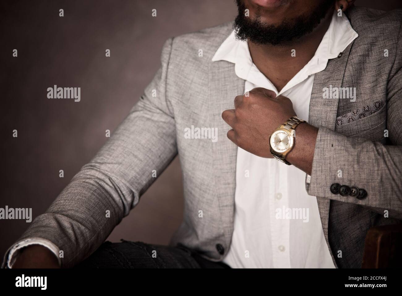 african stock photo of black gentlemen in smart clothes in studio ...