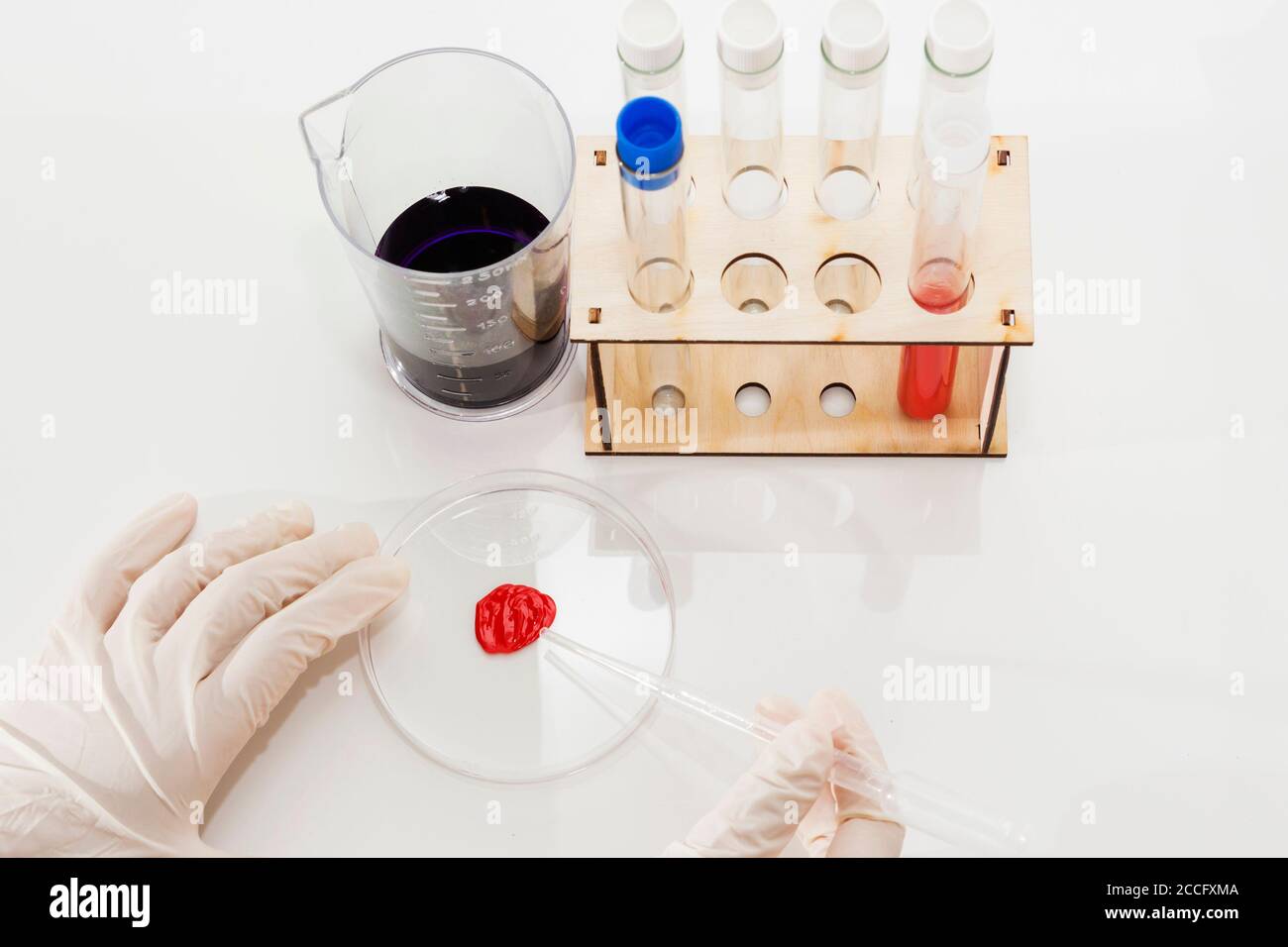 Lab tube, eppendorfs with red liquid. White background. Studio shot ...