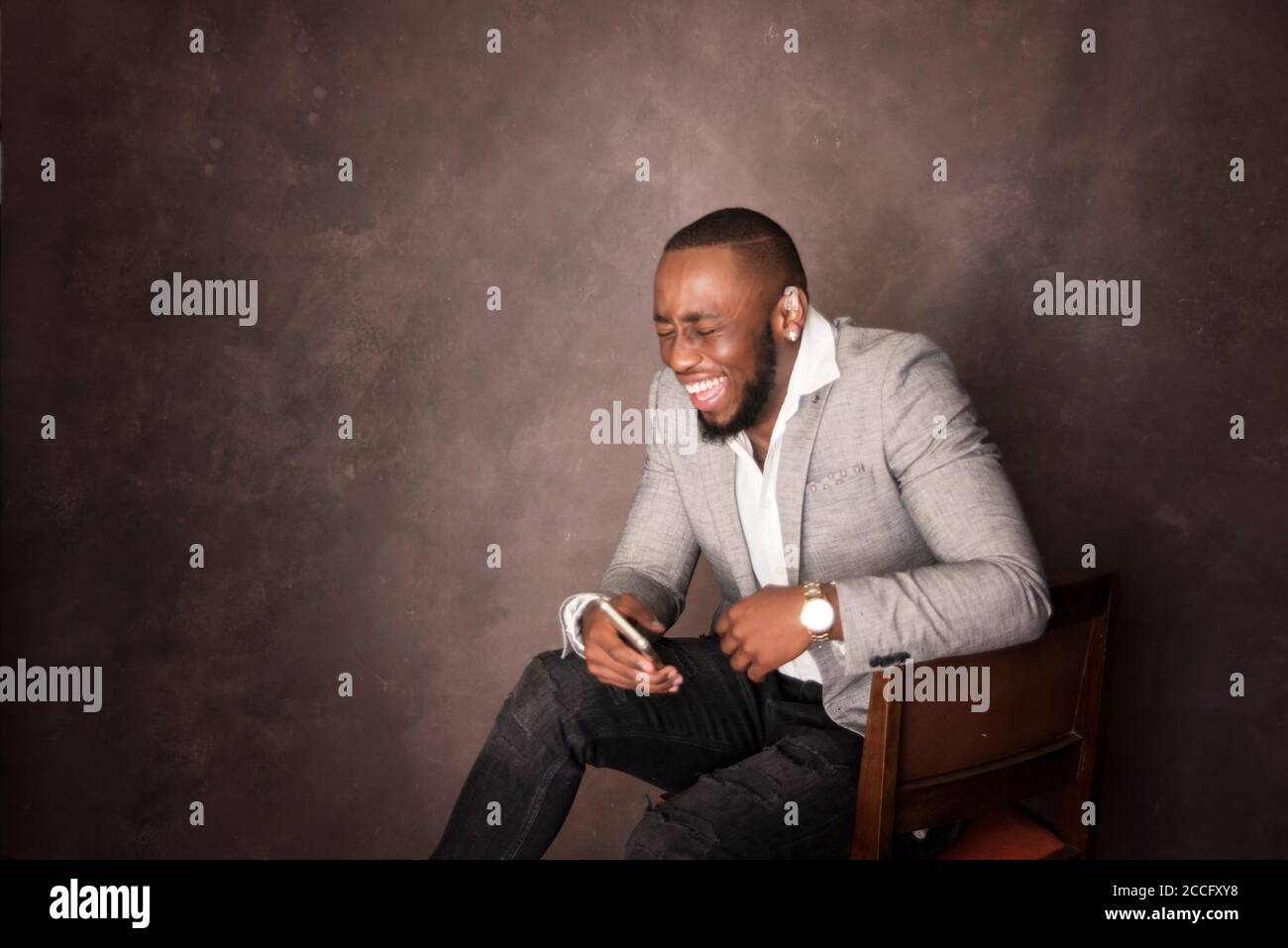african stock photo of black gentlemen in smart clothes in studio ...