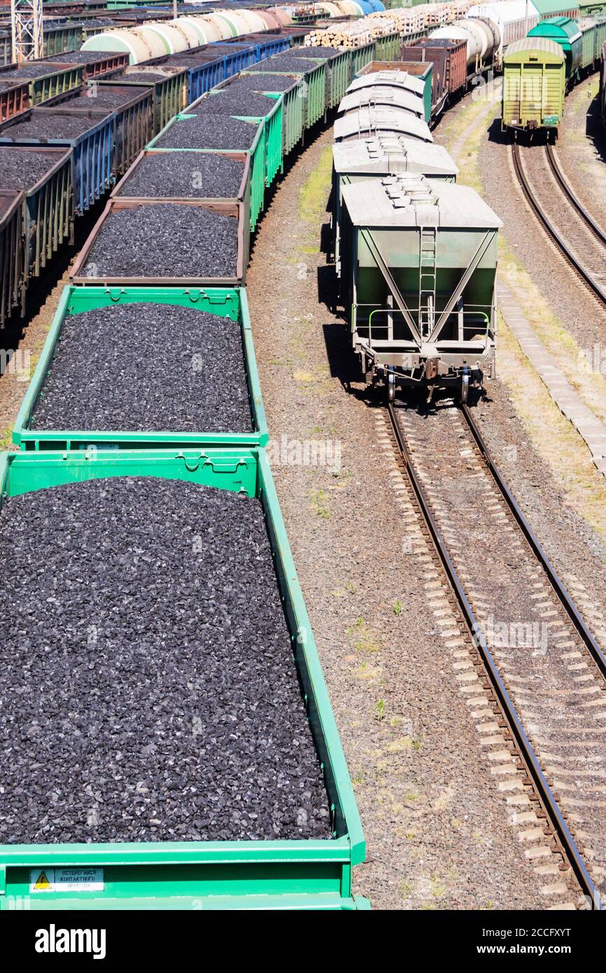 rail cars loaded with coal, a train transports coal Stock Photo - Alamy