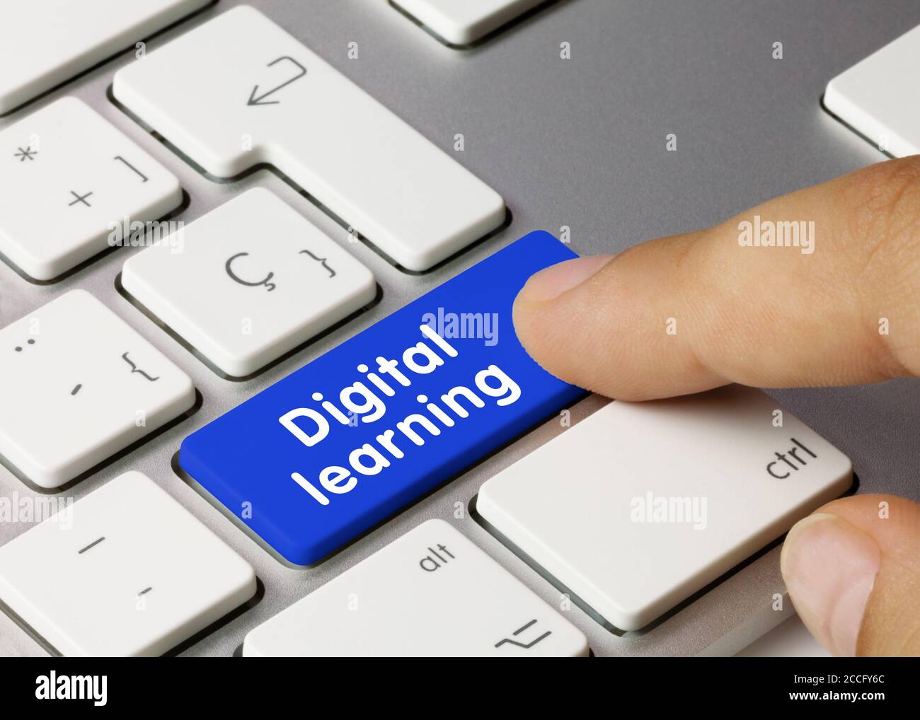Digital learning Written on Blue Key of Metallic Keyboard. Finger ...