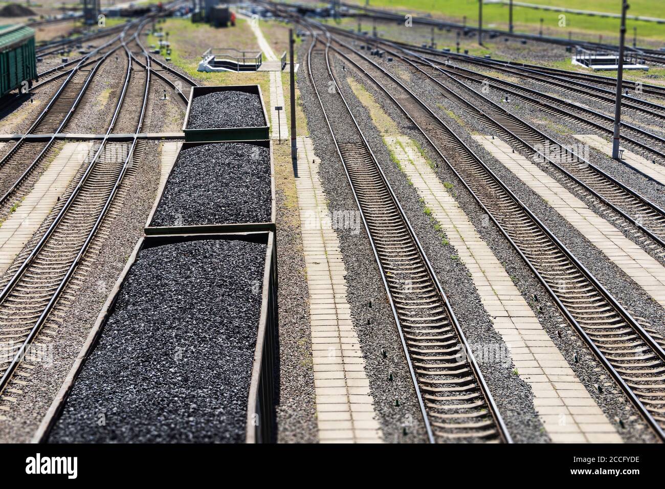 rail cars loaded with coal, a train transports coal Stock Photo - Alamy