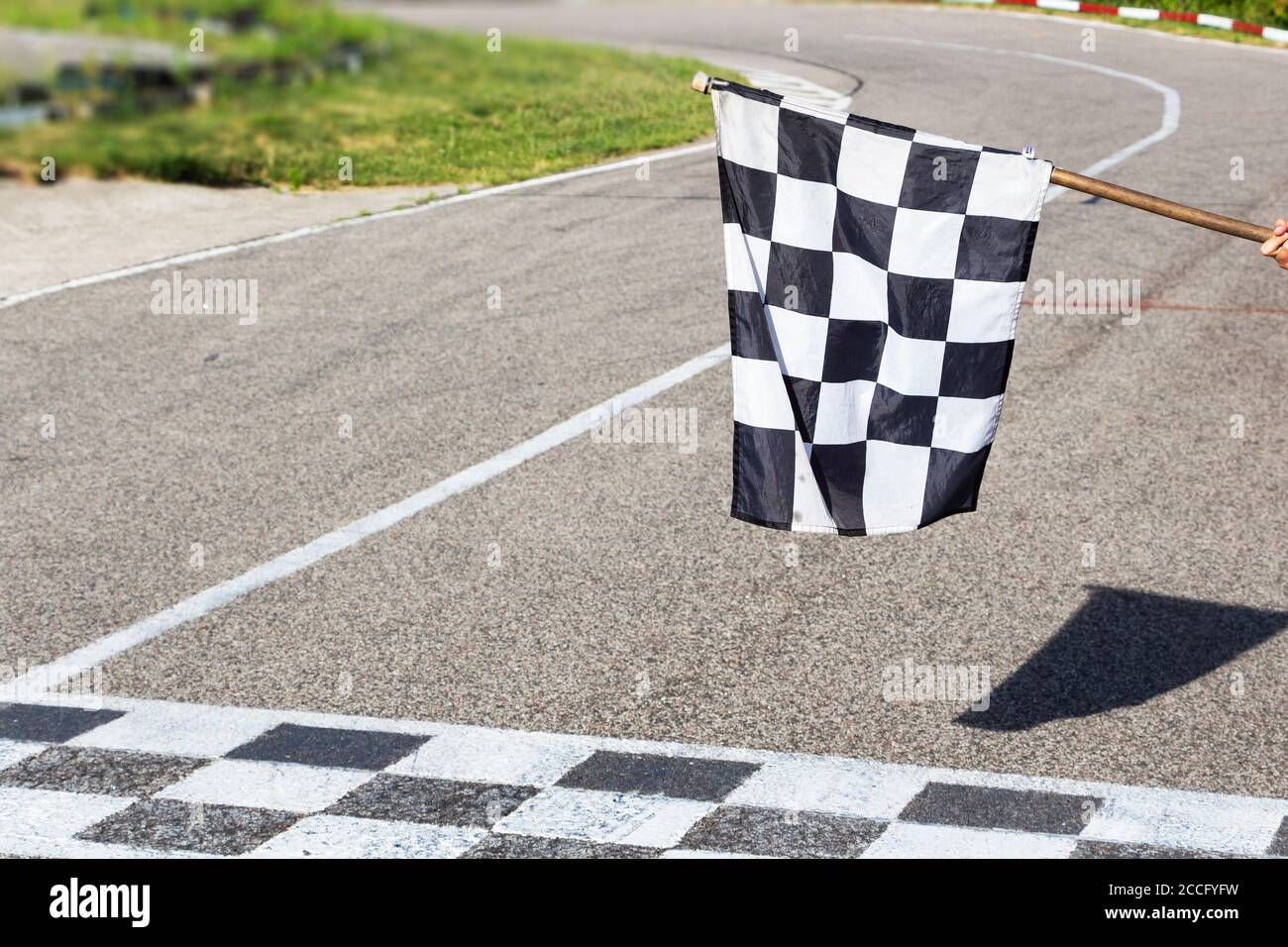 The finish line and checkered flag racing. finish the race Stock Photo - Alamy