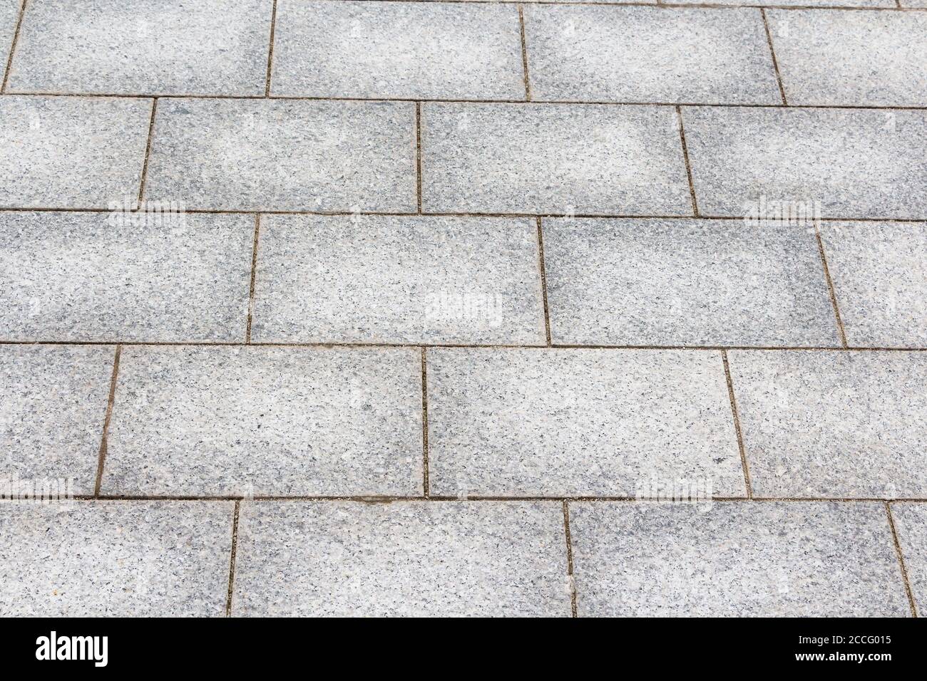 A street pavement of antique rectangular floor tiles Stock Photo - Alamy