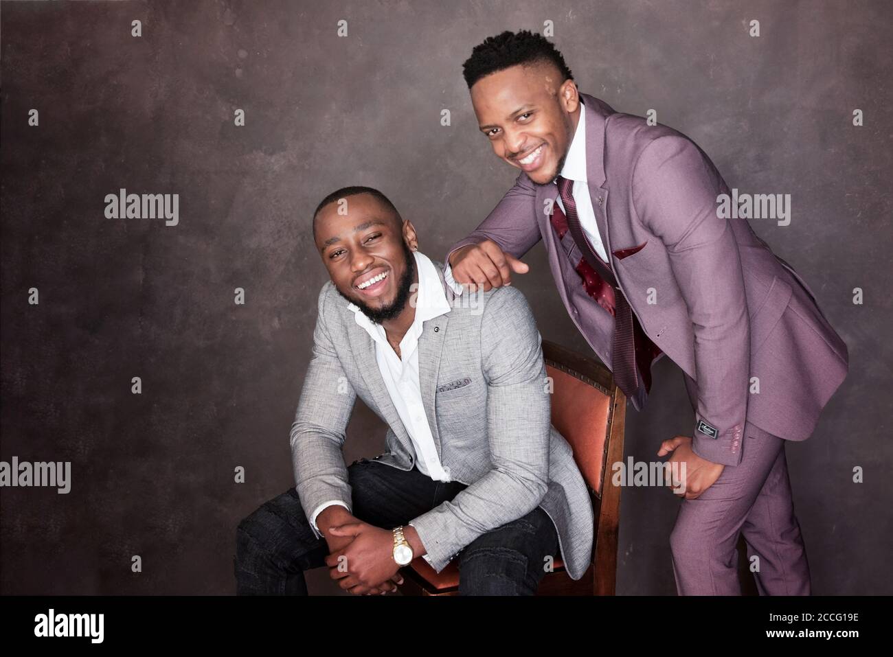 african stock photo of black gentlemen in smart clothes in studio ...