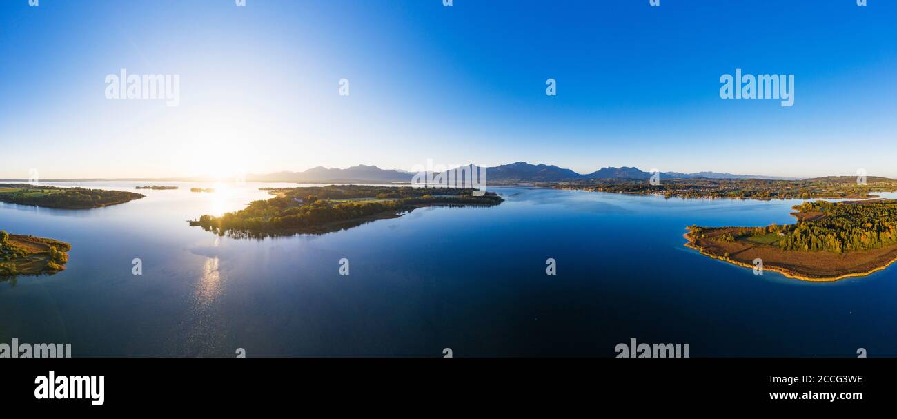 Panorama from Lake Chiemsee at sunrise, Herreninsel and Sassau ...