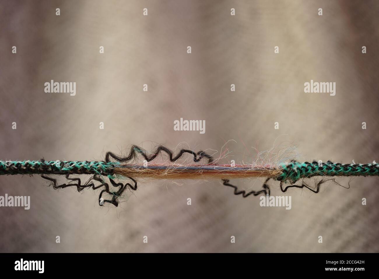 Torn rope hi-res stock photography and images - Alamy