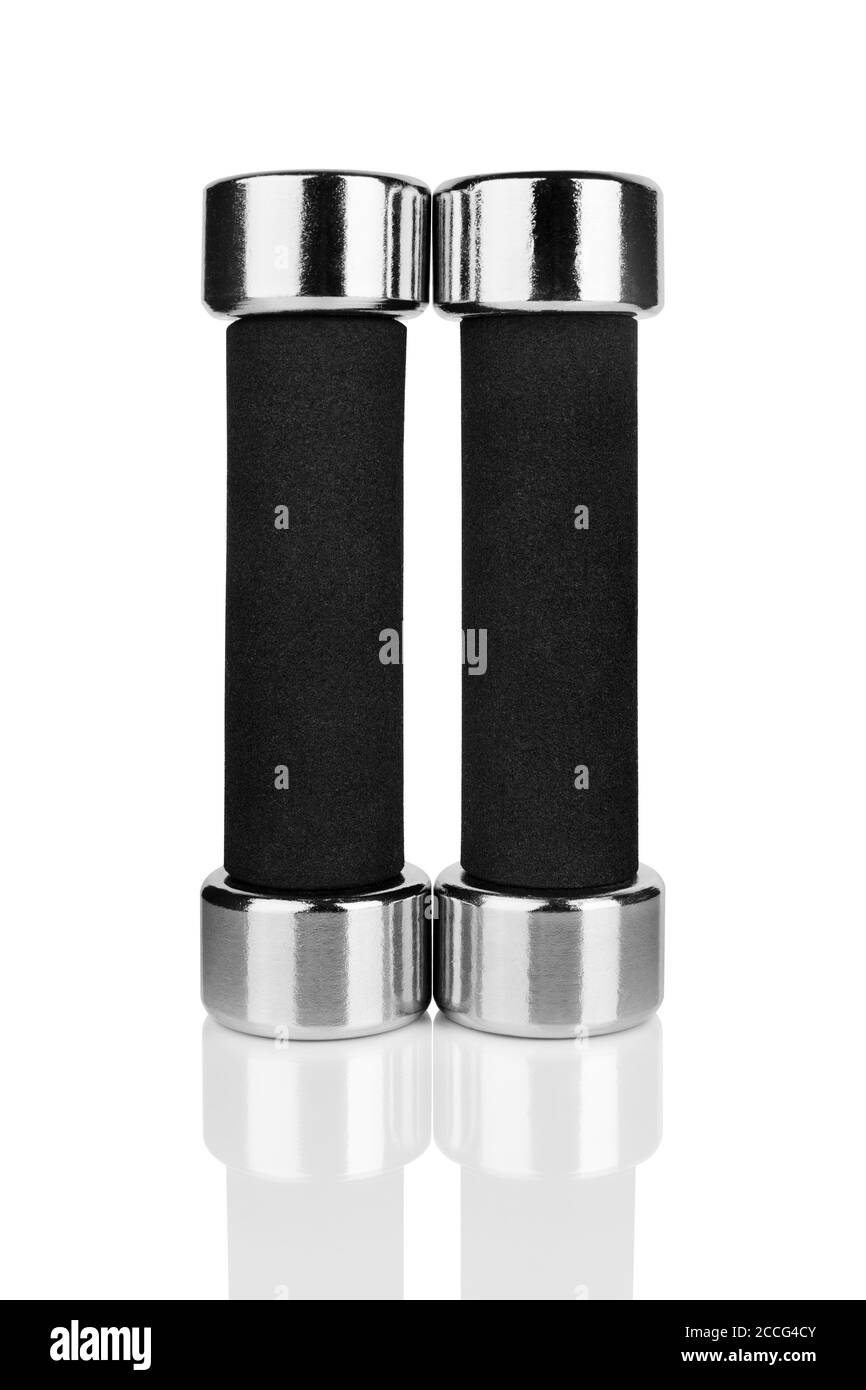Two dumbbells on white background isolated close up with reflection ...