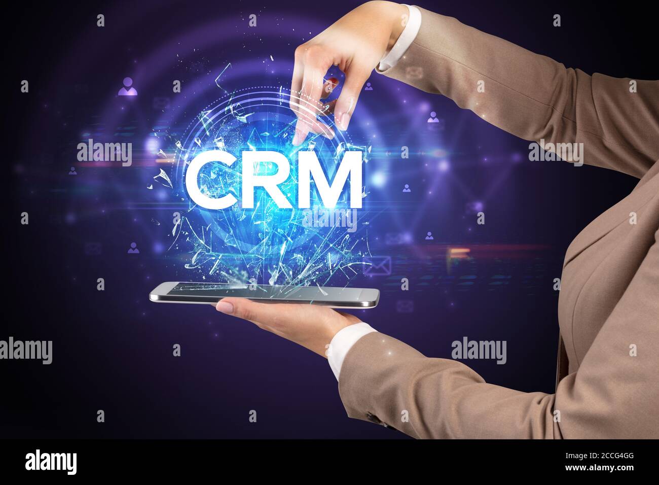 Close-up of a touchscreen with CRM abbreviation, modern technology ...