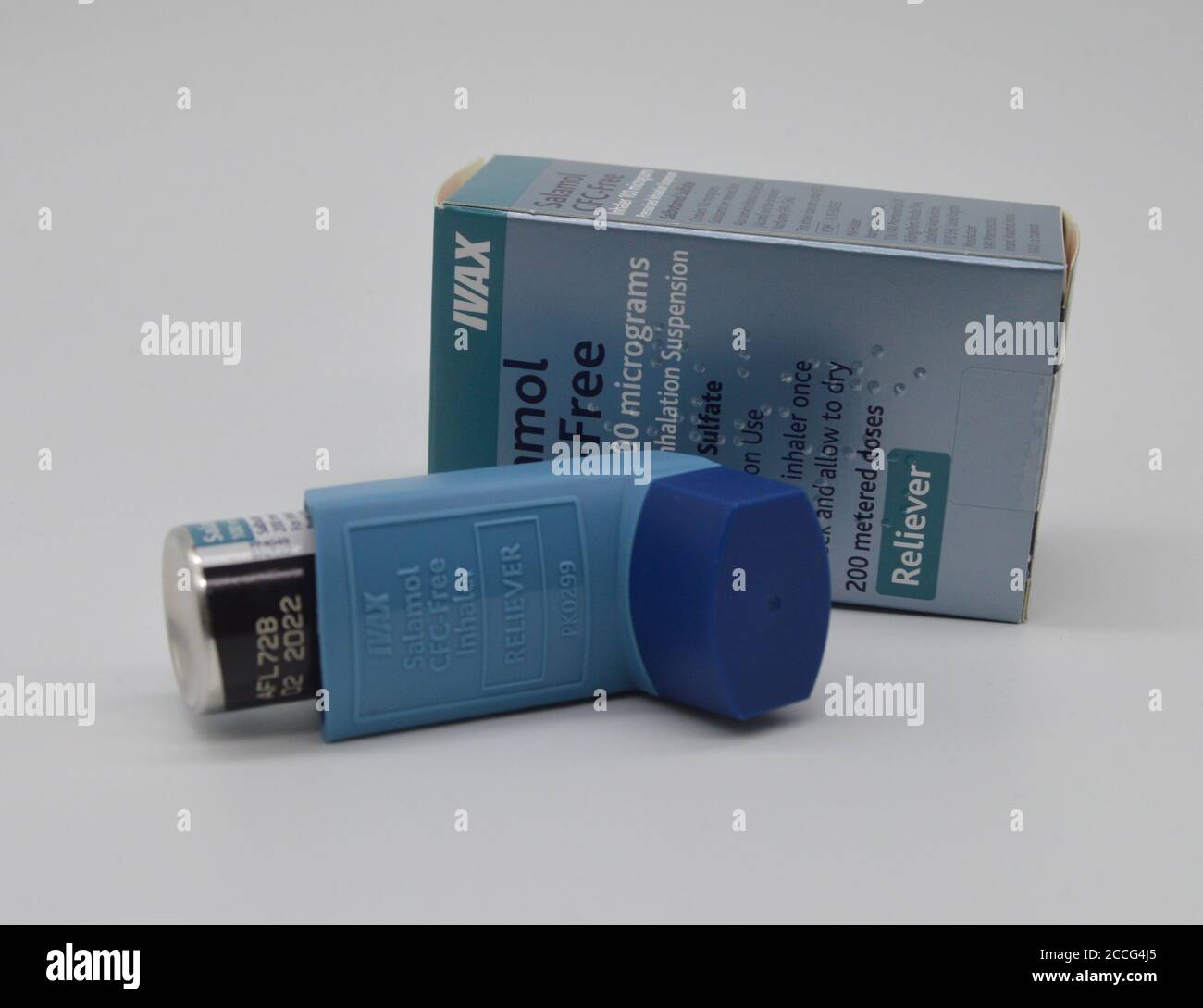 Asthma Inhaler with white background Stock Photo - Alamy