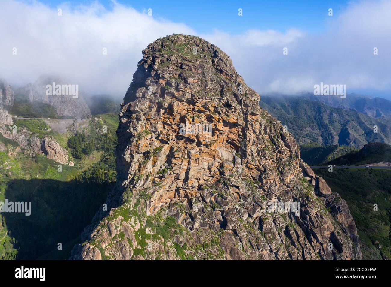 Roque de agando rock tower with trade wind clouds hi-res stock ...