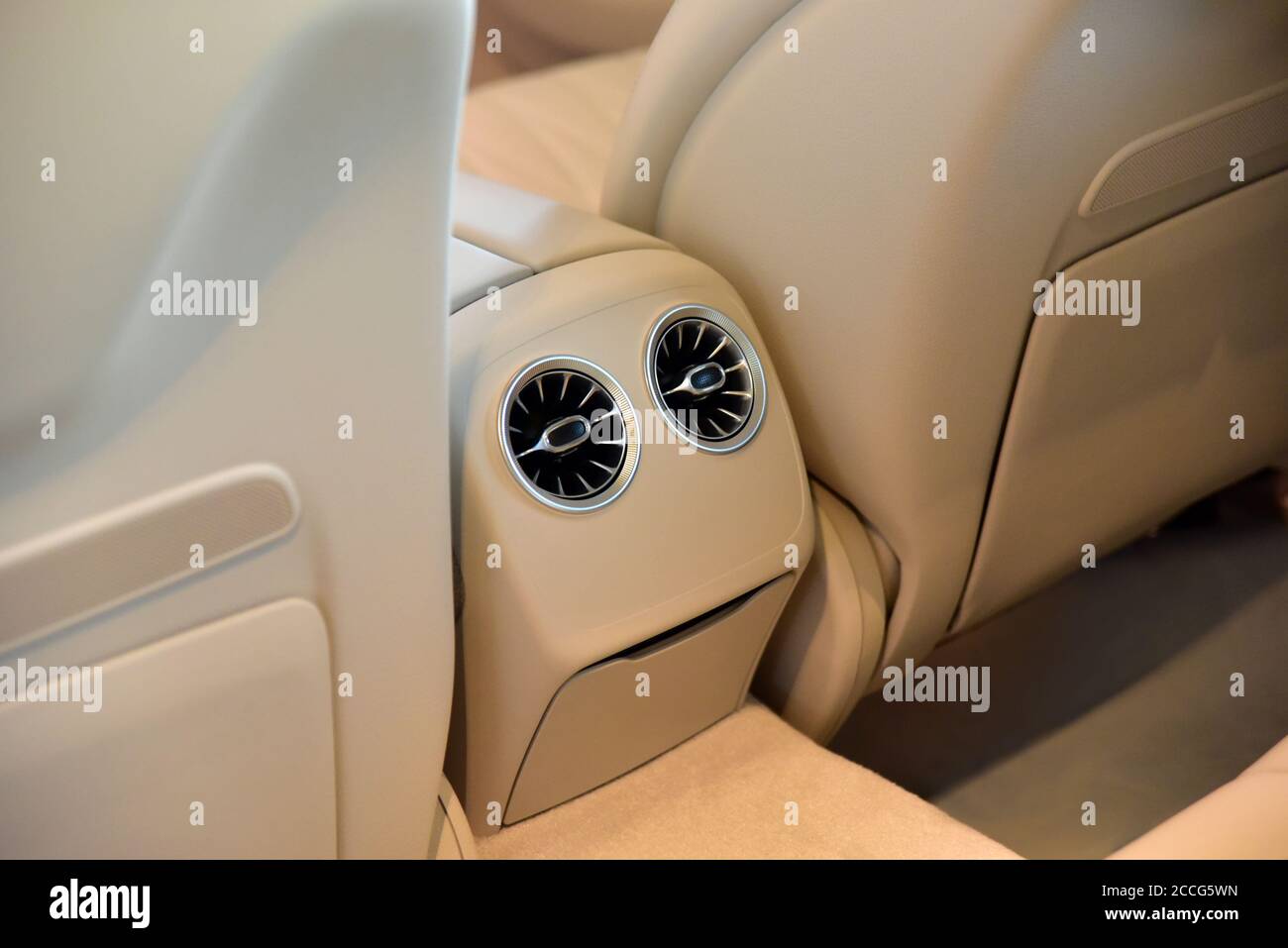Rear passenger air vent of modern luxury car Stock Photo - Alamy
