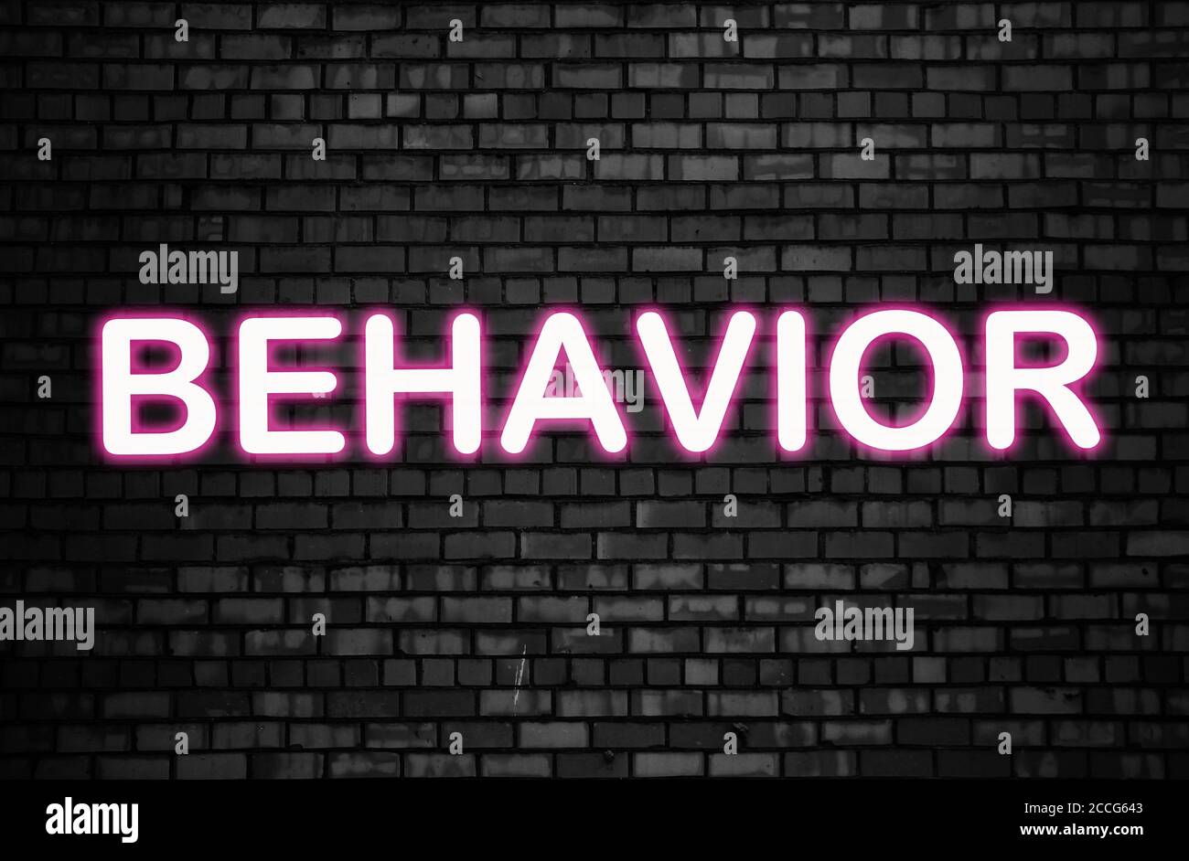 Behavior pink neon sign on brick wall background. Social role concept ...
